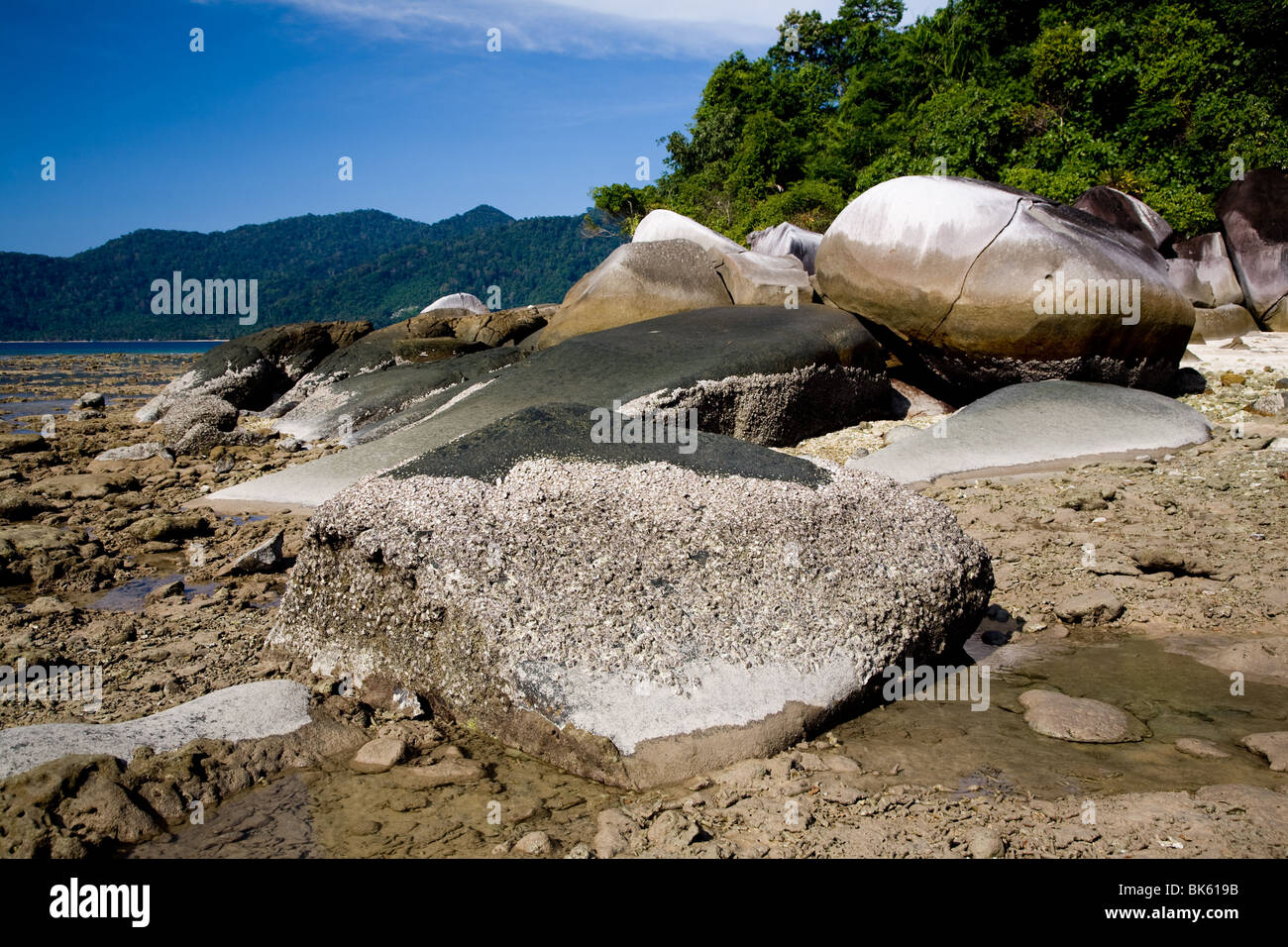 Tioman island coastline beach rock formation asia Stock Photo - Alamy