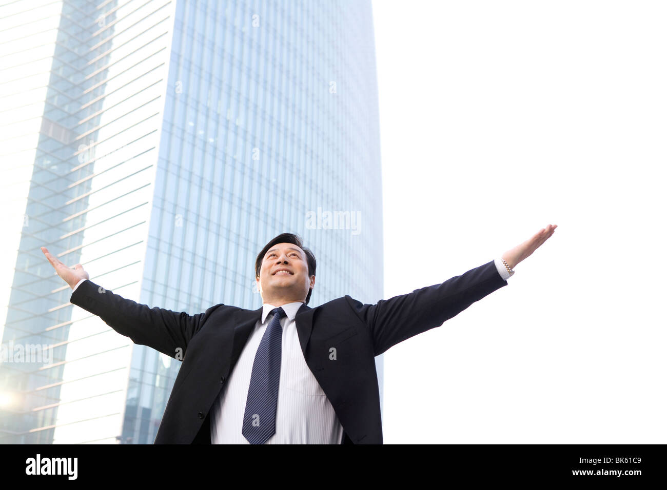 Business Leader With Arms Outstretched Stock Photo - Alamy