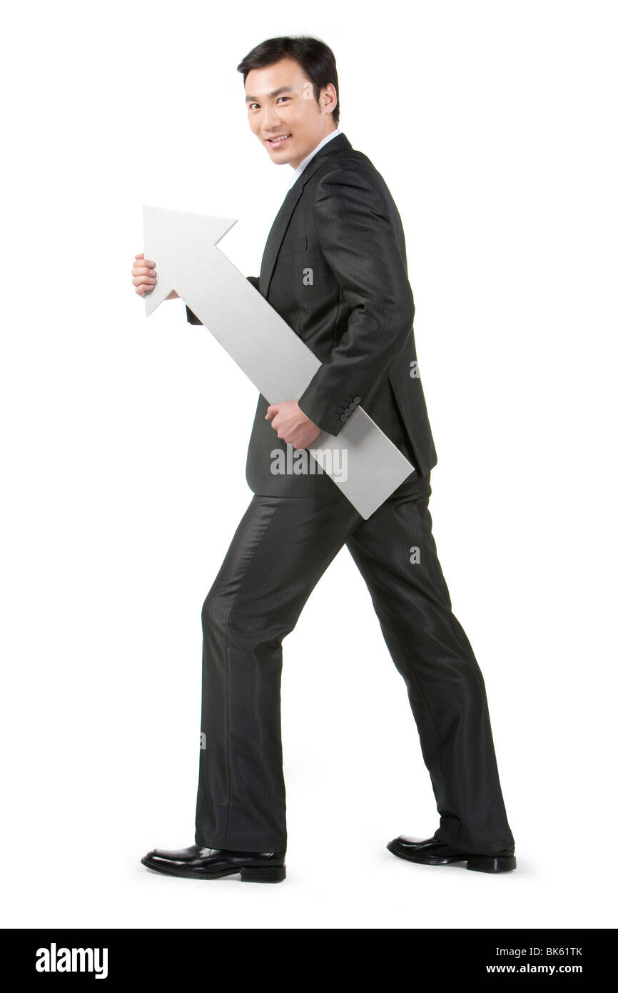 Man holding down arrow Cut Out Stock Images & Pictures - Alamy