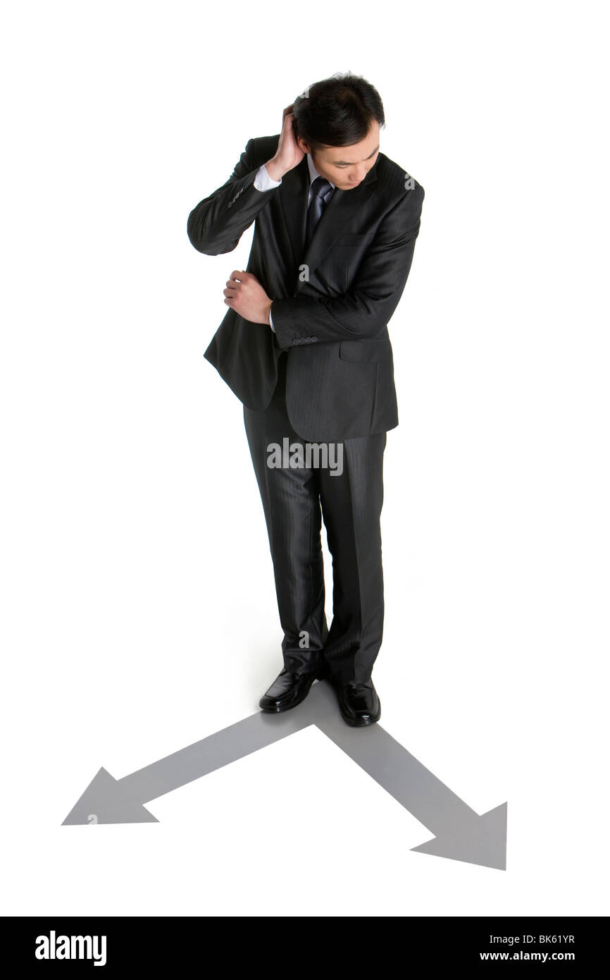 Businessman thinking for direction Stock Photo - Alamy
