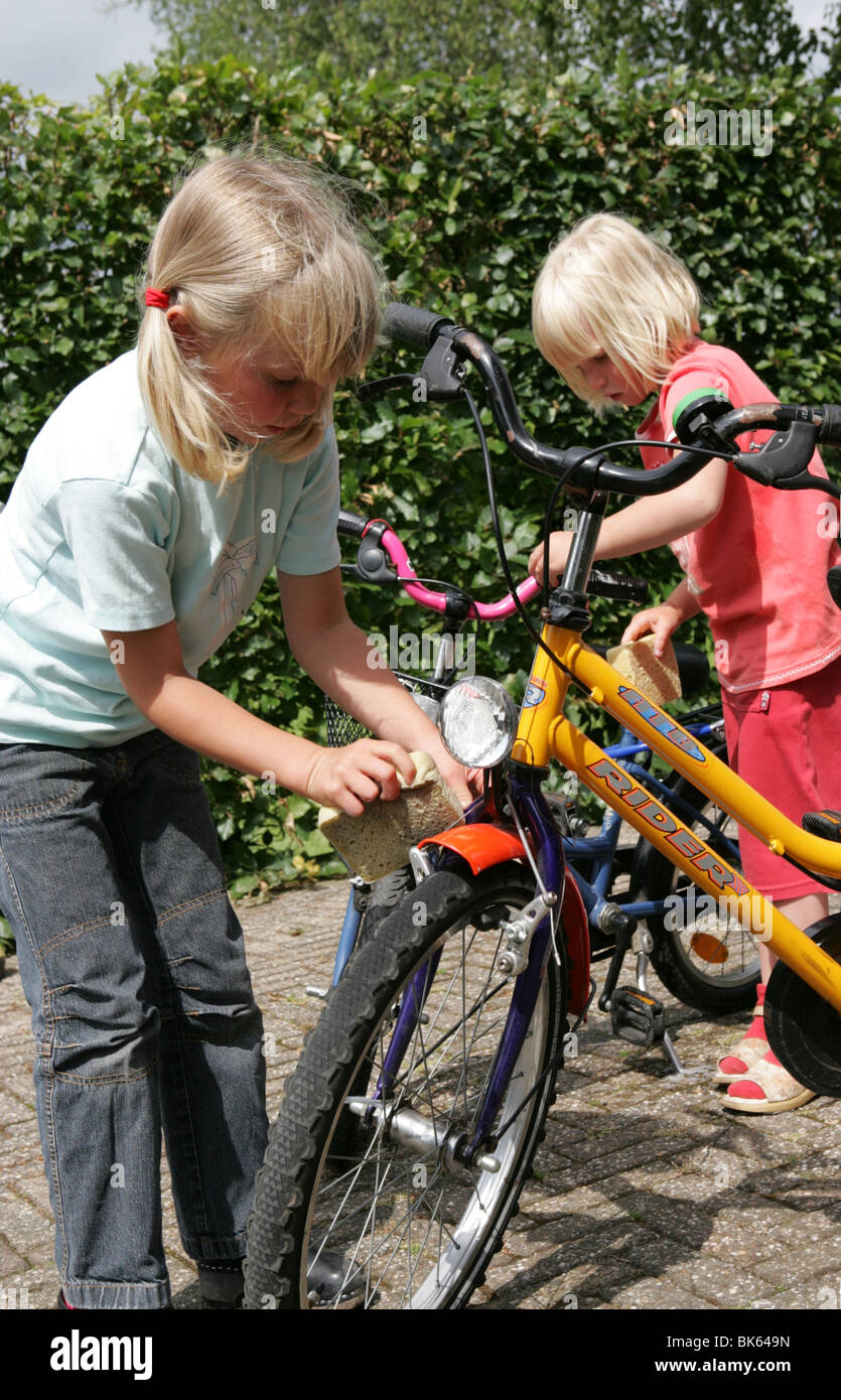 Kids washing bike hi-res stock photography and images - Alamy