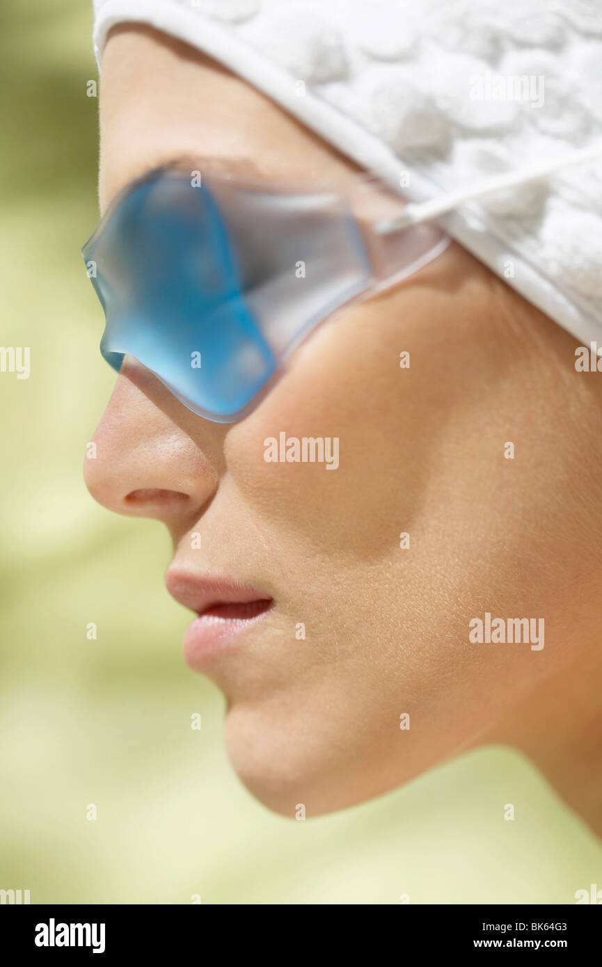 Close-up of a young woman wearing an eye mask Stock Photo - Alamy