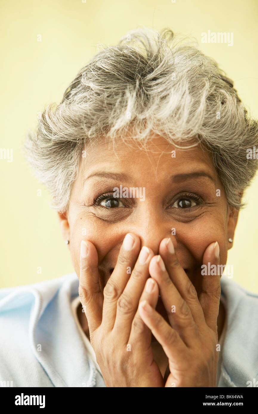 Portrait of a senior woman giggling Stock Photo - Alamy