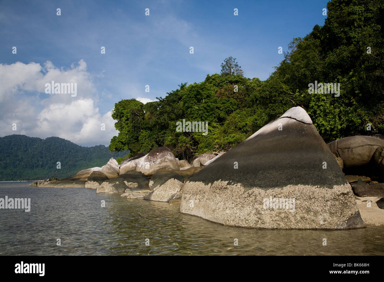 Tioman island coastline beach rock formation asia Stock Photo - Alamy