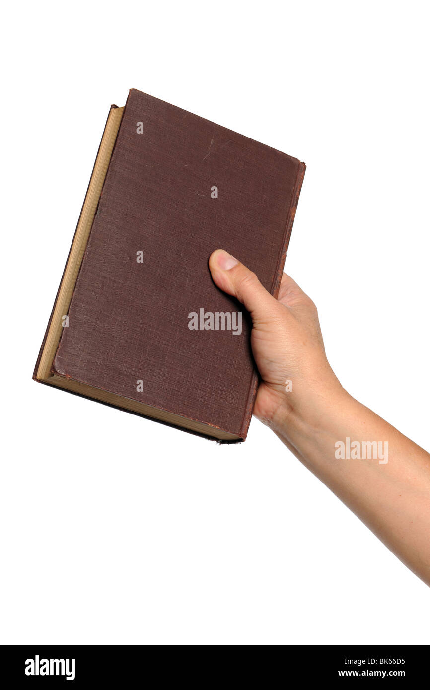 Hand holding book hi-res stock photography and images - Alamy