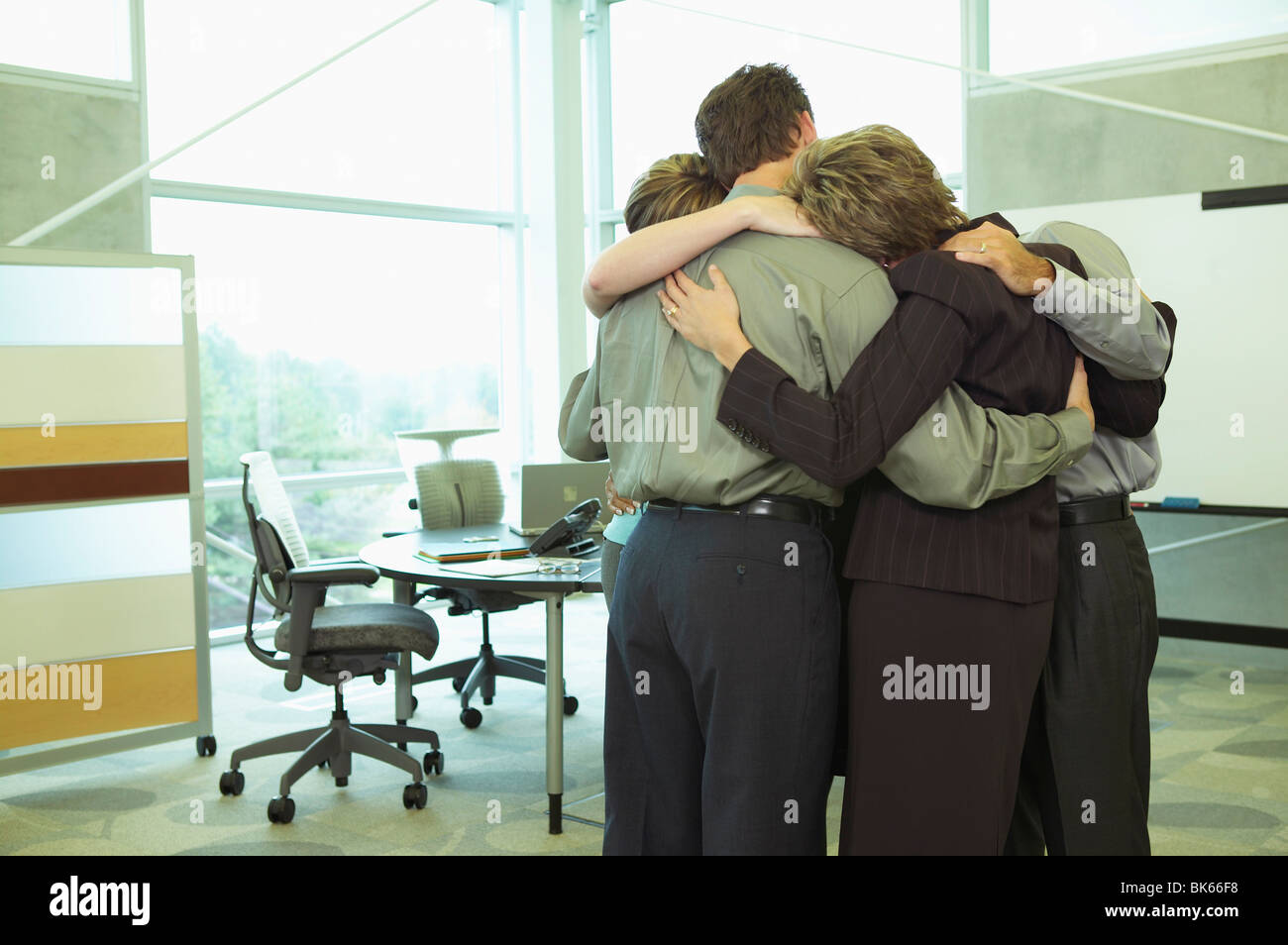 Executives brainstorming around a table hi-res stock photography and ...