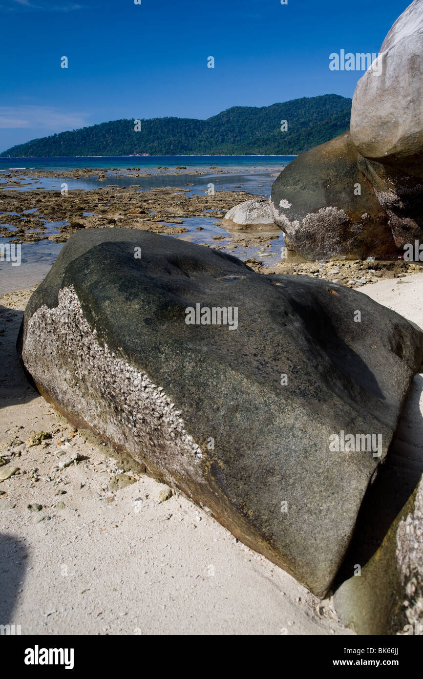 Tioman island coastline beach rock formation asia Stock Photo - Alamy