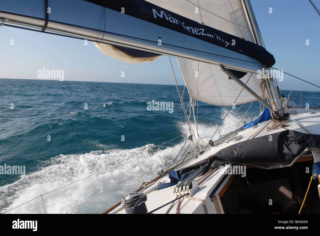 Sailing yacht off coast hi-res stock photography and images - Alamy