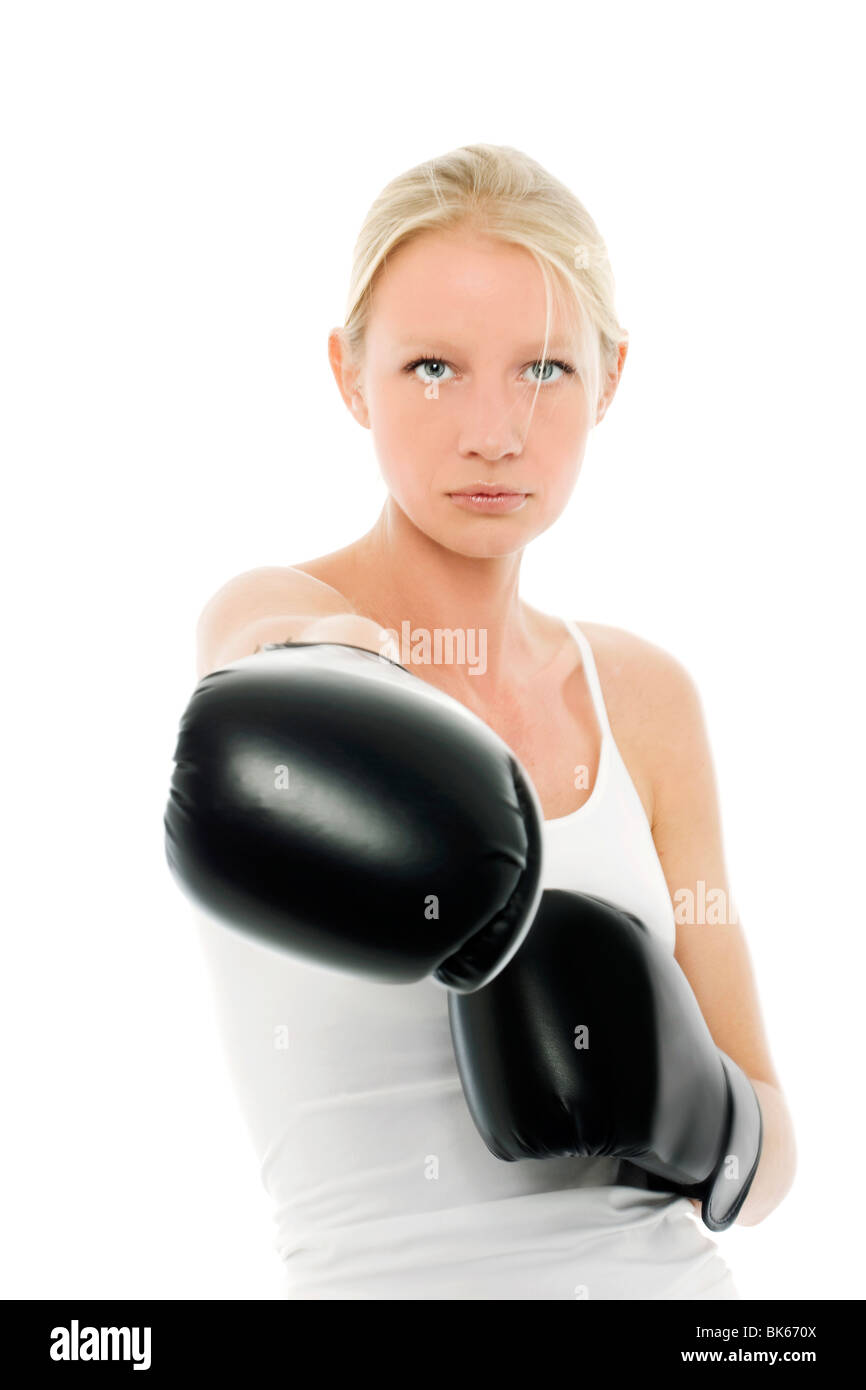 portrait of a young caucasian woman who does kick boxing with boxing ...
