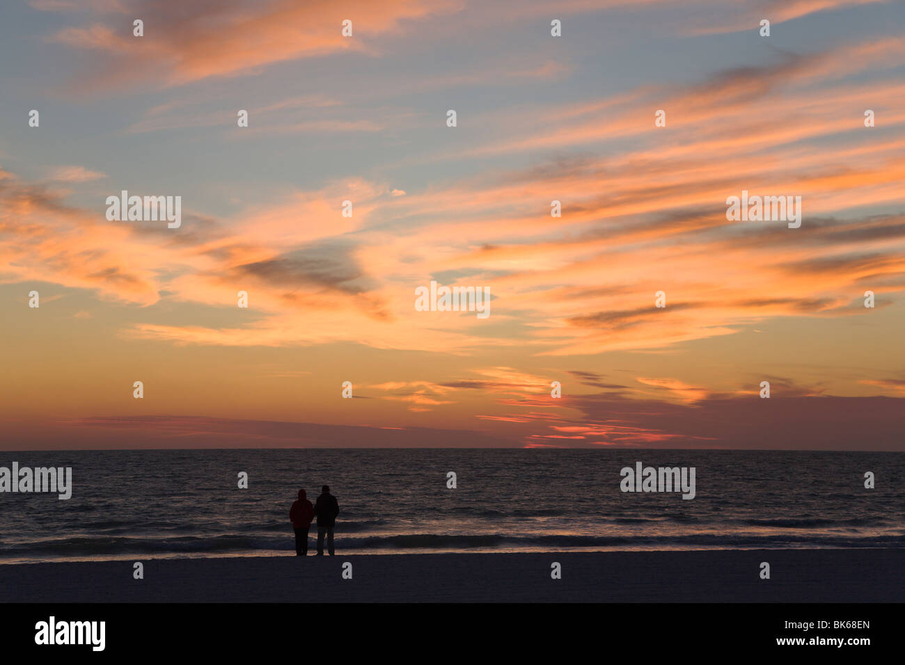Two people watching sunset hi-res stock photography and images - Alamy