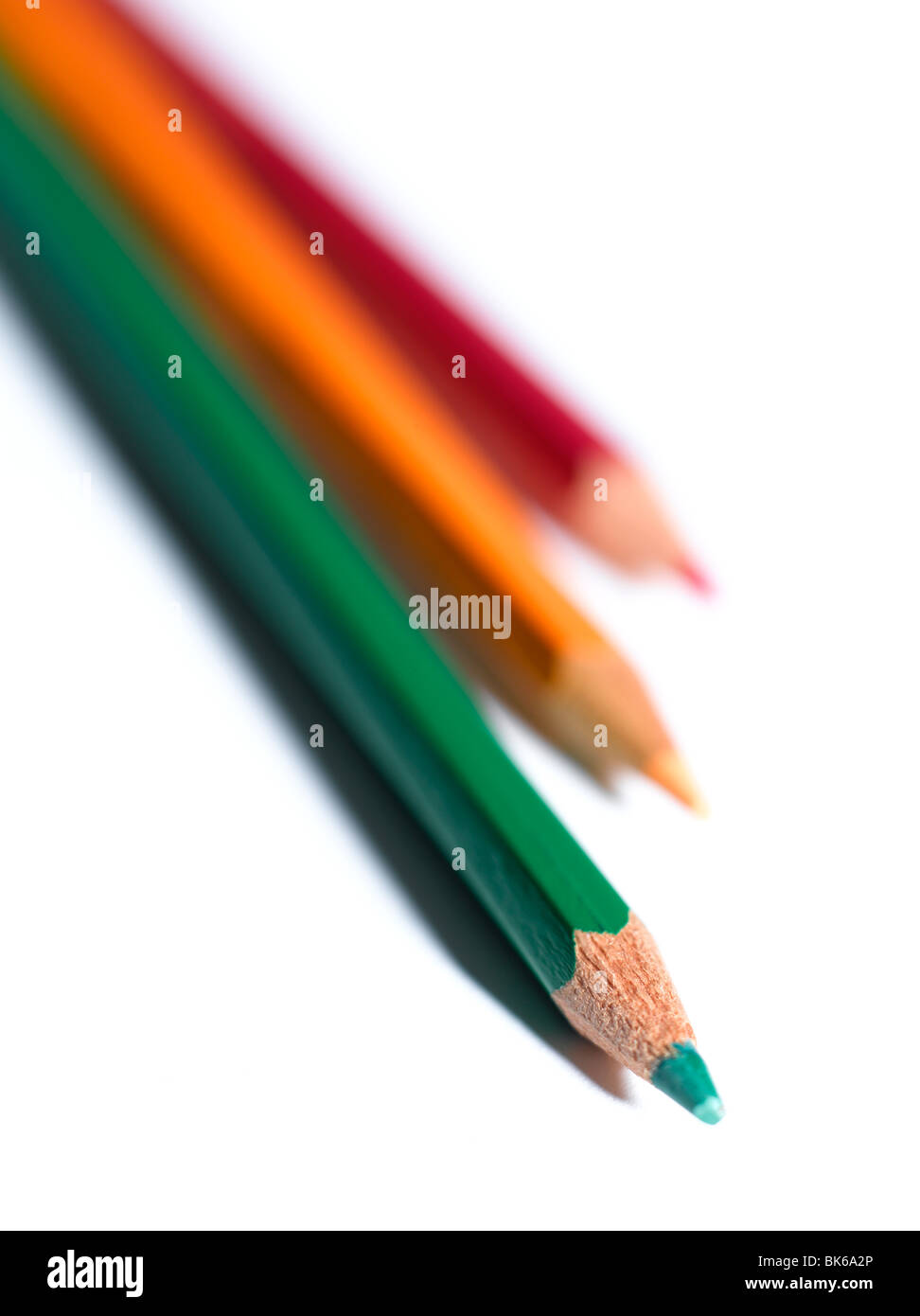 Trio of pencil crayons Stock Photo - Alamy