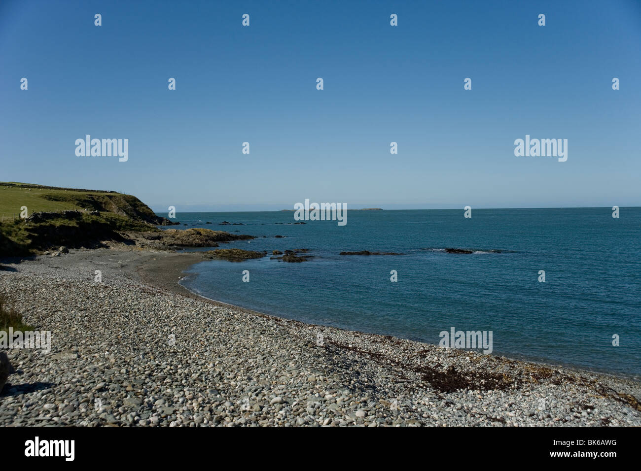 Skerries Lighthouse and Carmel Head from the Anglesey coastal path ...