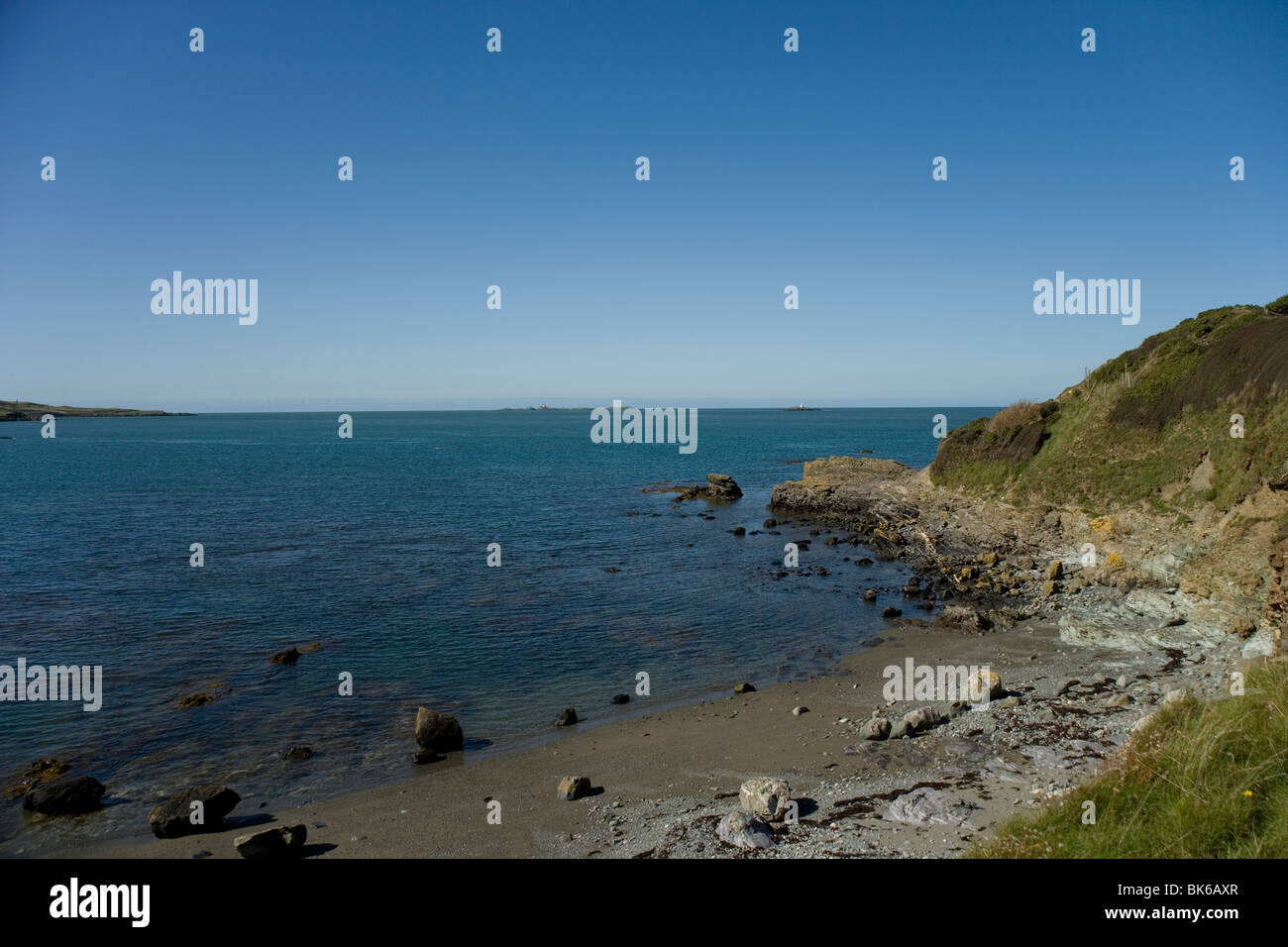 Skerries Lighthouse and Carmel Head from the Anglesey coastal path ...