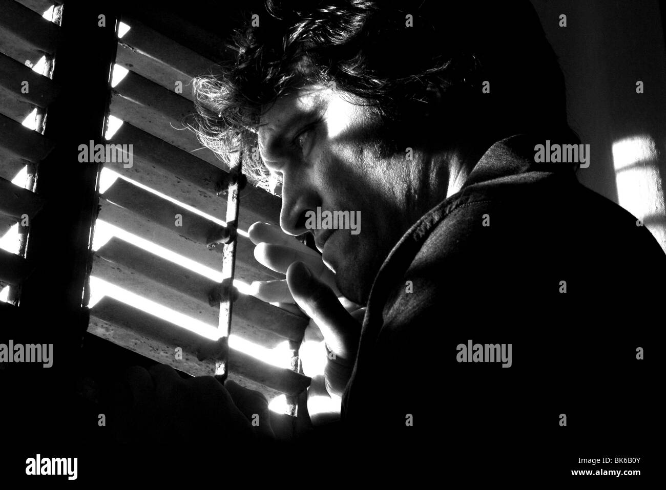 Man peeking window Black and White Stock Photos & Images - Alamy