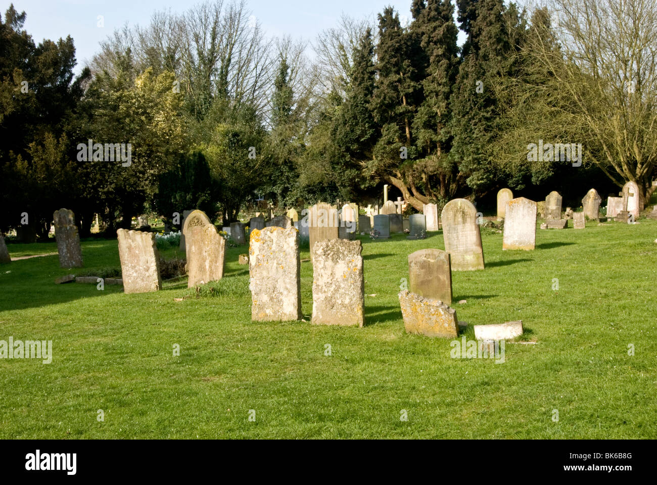Churchyard and cemetery with graves and headstones hi-res stock ...