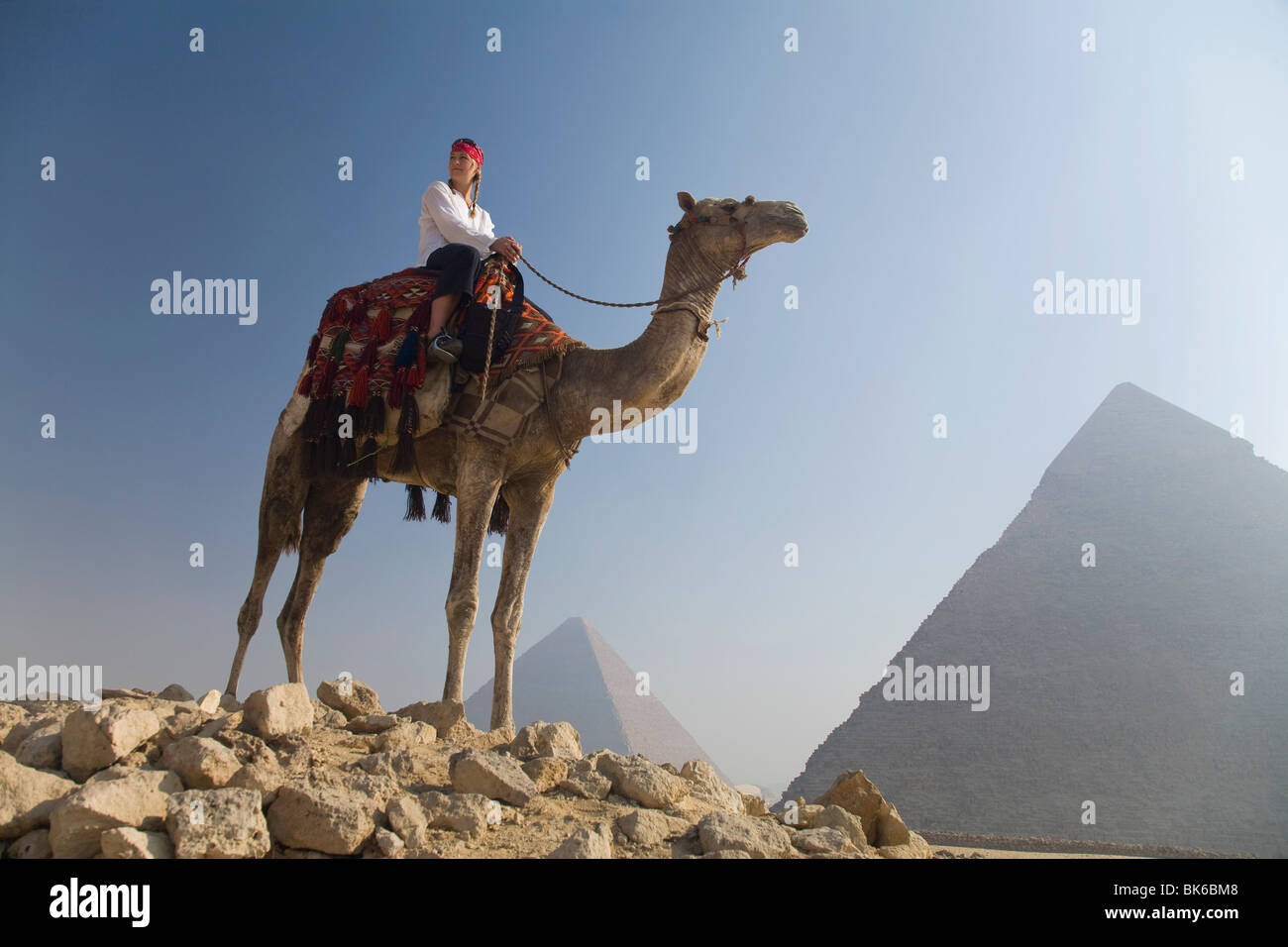 Female tourist camel ruins hi-res stock photography and images - Alamy