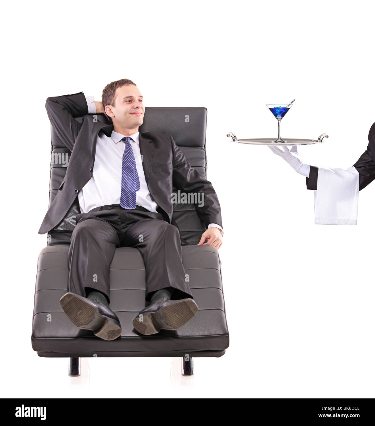 Businessman relaxing on leather sofa hi-res stock photography and ...