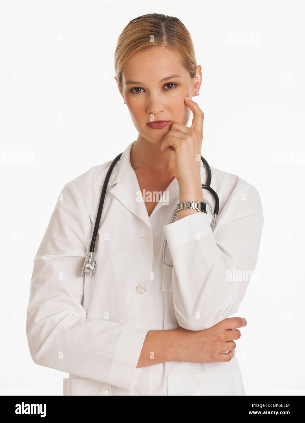 serious female doctor looking at camera with seamless background Stock ...