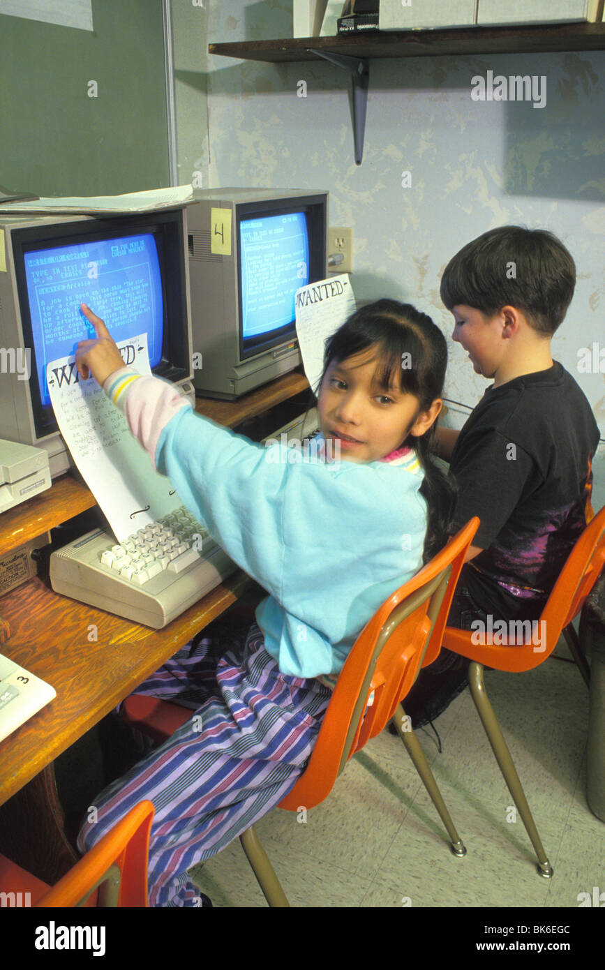 released ethnic elementary school students computer class Stock Photo ...