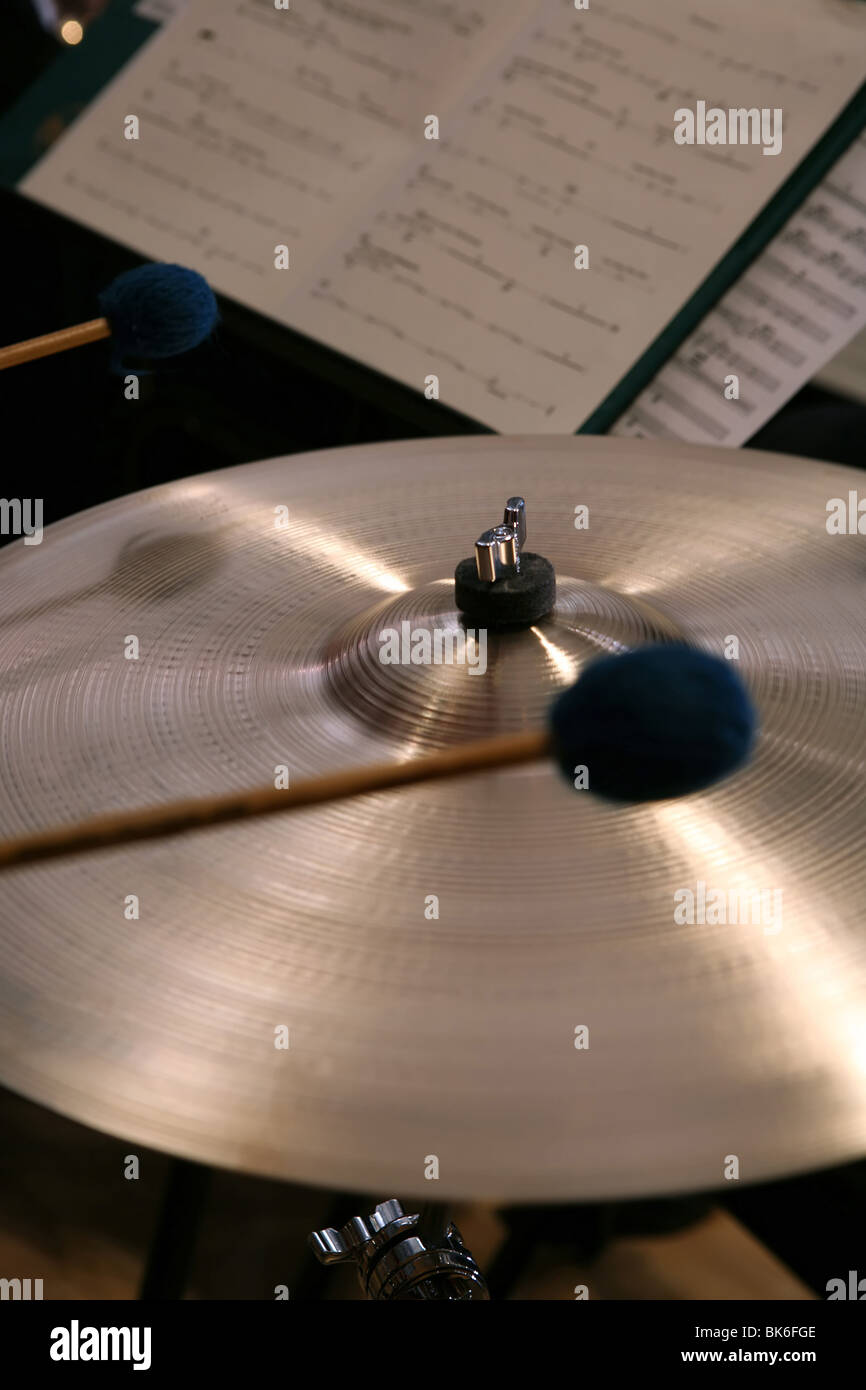 Cymbal about to be struck by drumstick Stock Photo - Alamy