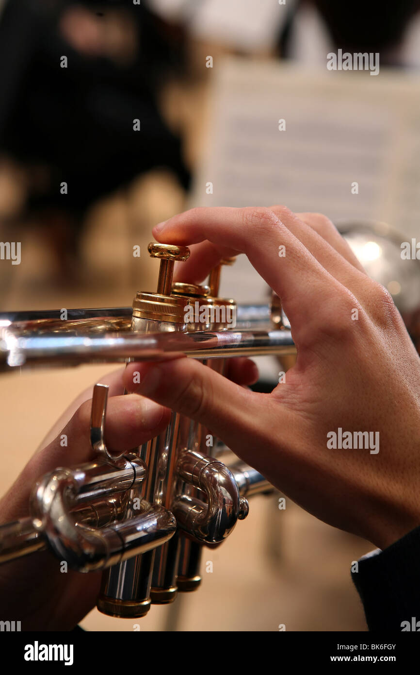 Playing trumpet hand hi-res stock photography and images - Alamy