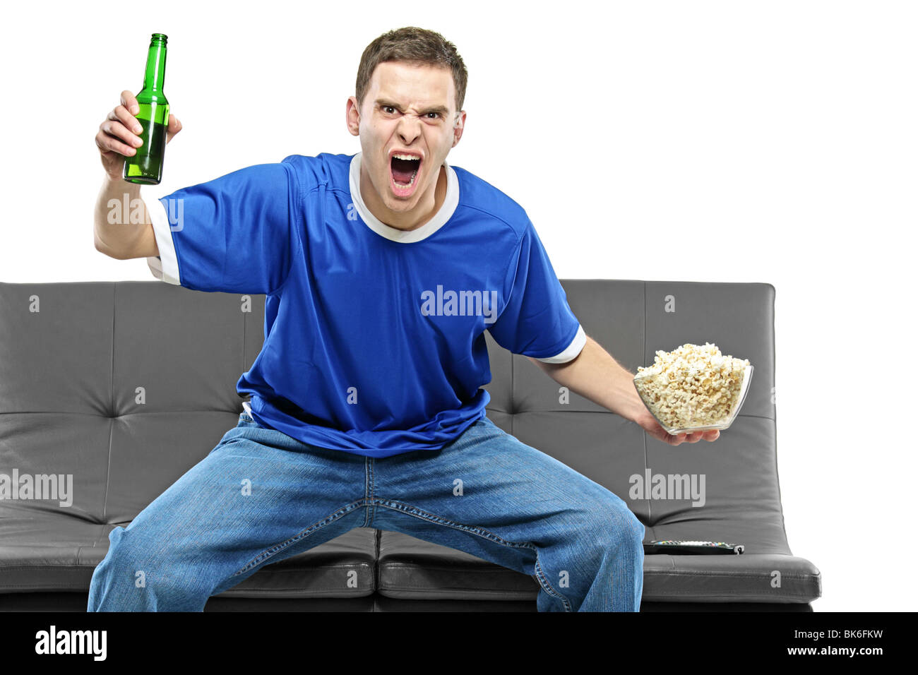 Excited man watching sport isolated on white background Stock Photo - Alamy
