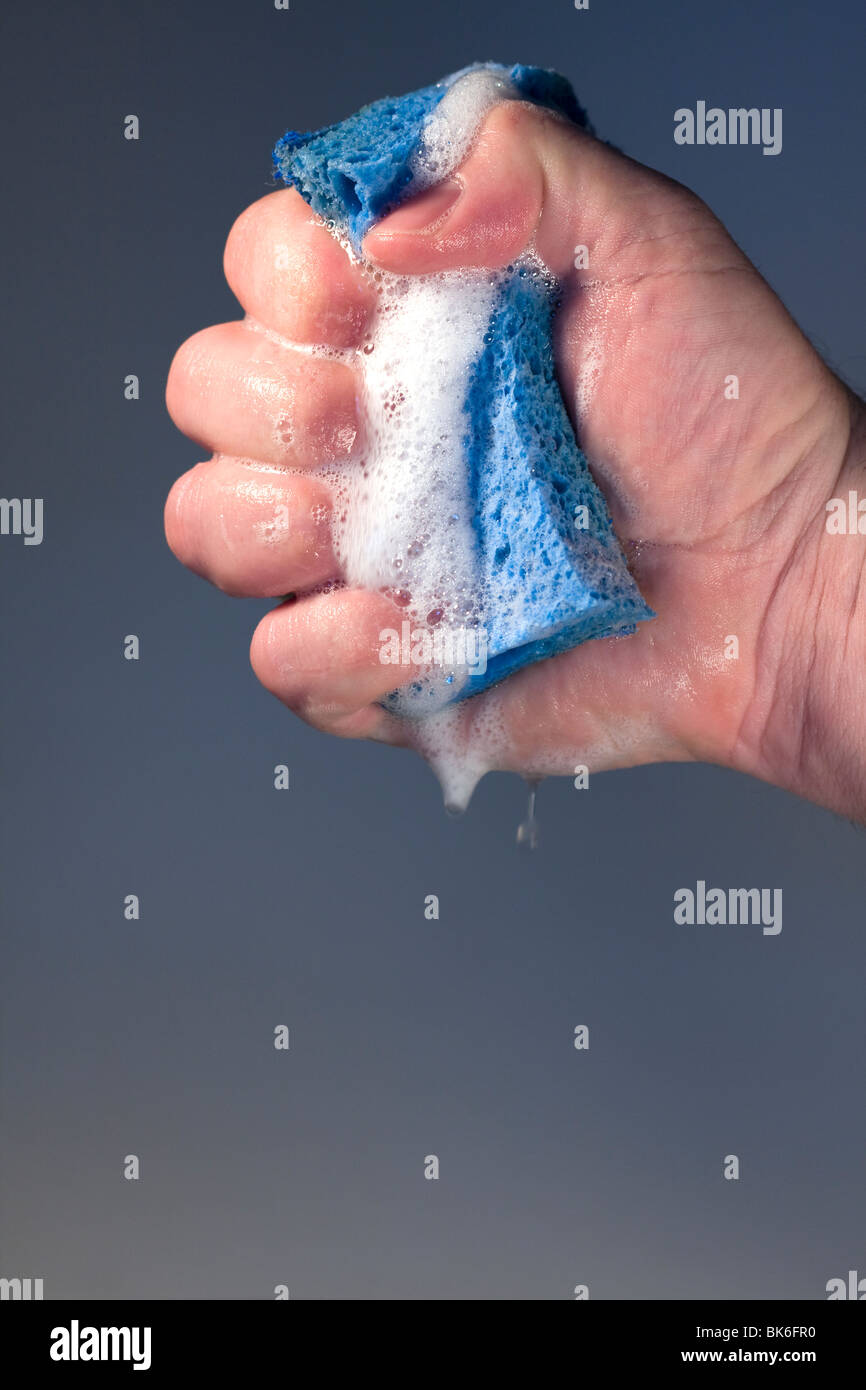 Squeezing sponge hi-res stock photography and images - Alamy