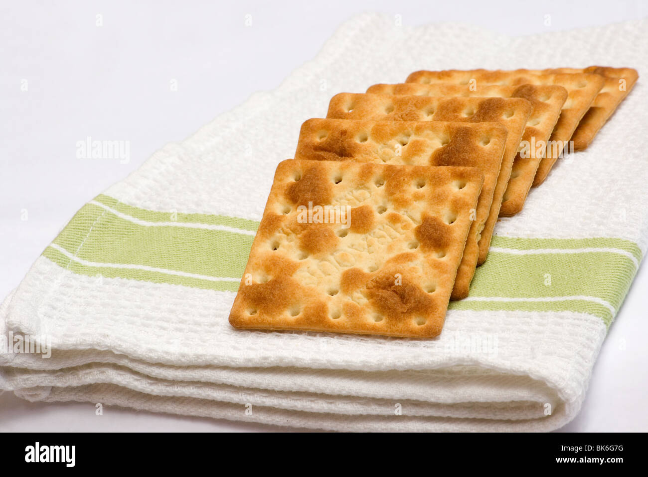 Cream crackers close-up on white baclkground Stock Photo - Alamy