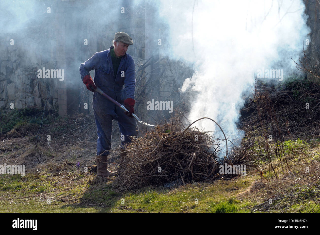 Burning Waste Man High Resolution Stock Photography and Images - Alamy
