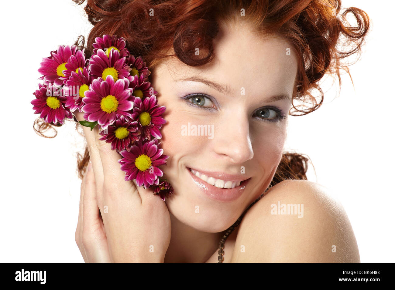 Portrait of a happy women with flowers Stock Photo - Alamy
