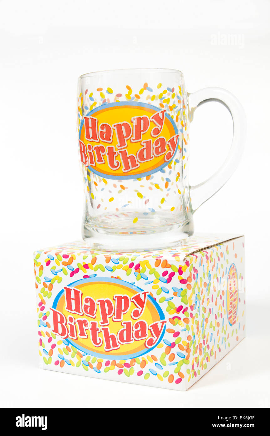 Happy Birthday beer glass and wrapping on white background Stock Photo ...