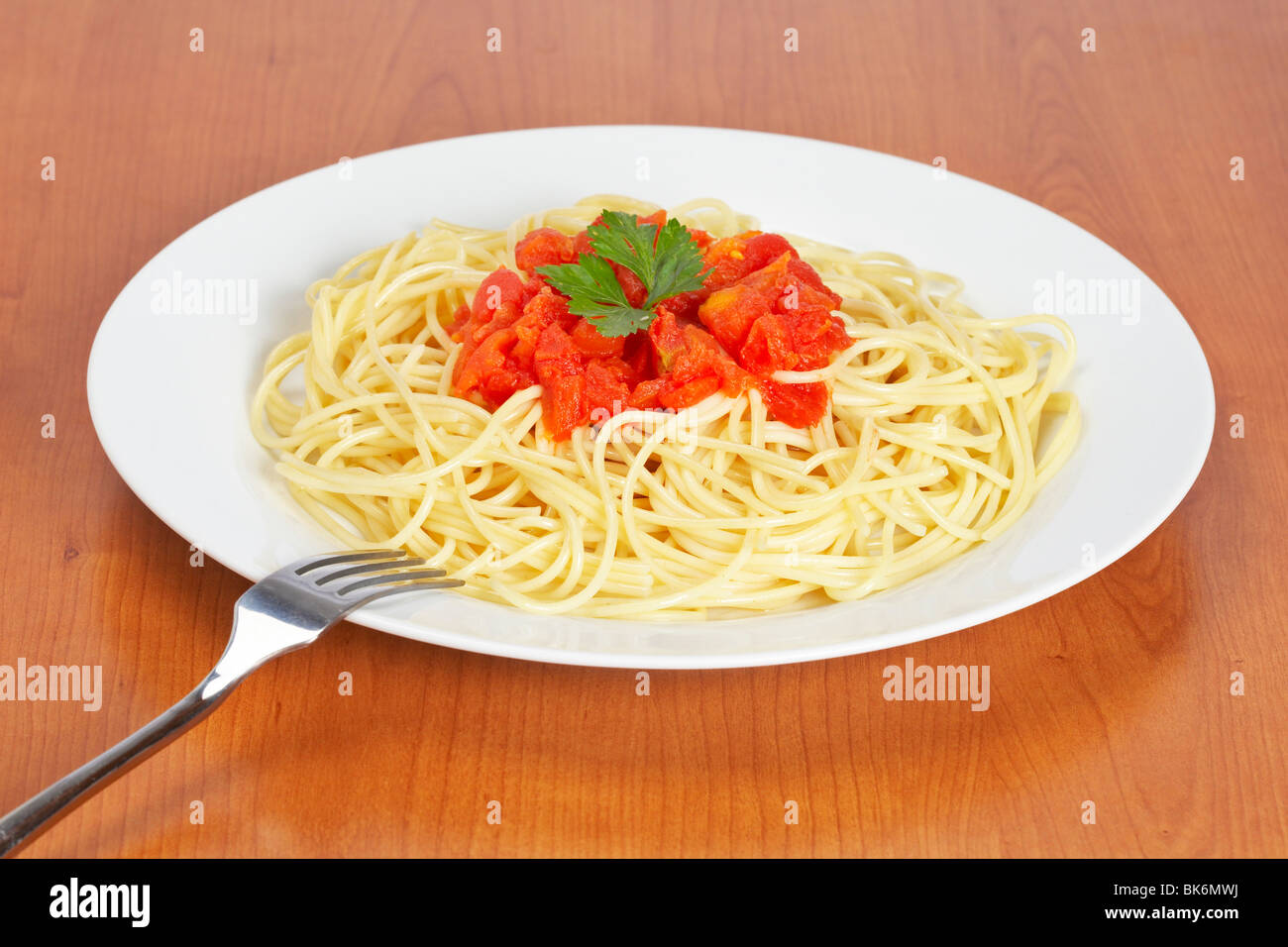 Freshly cooked plate of spaghetti with tomato sauce just for eating ...