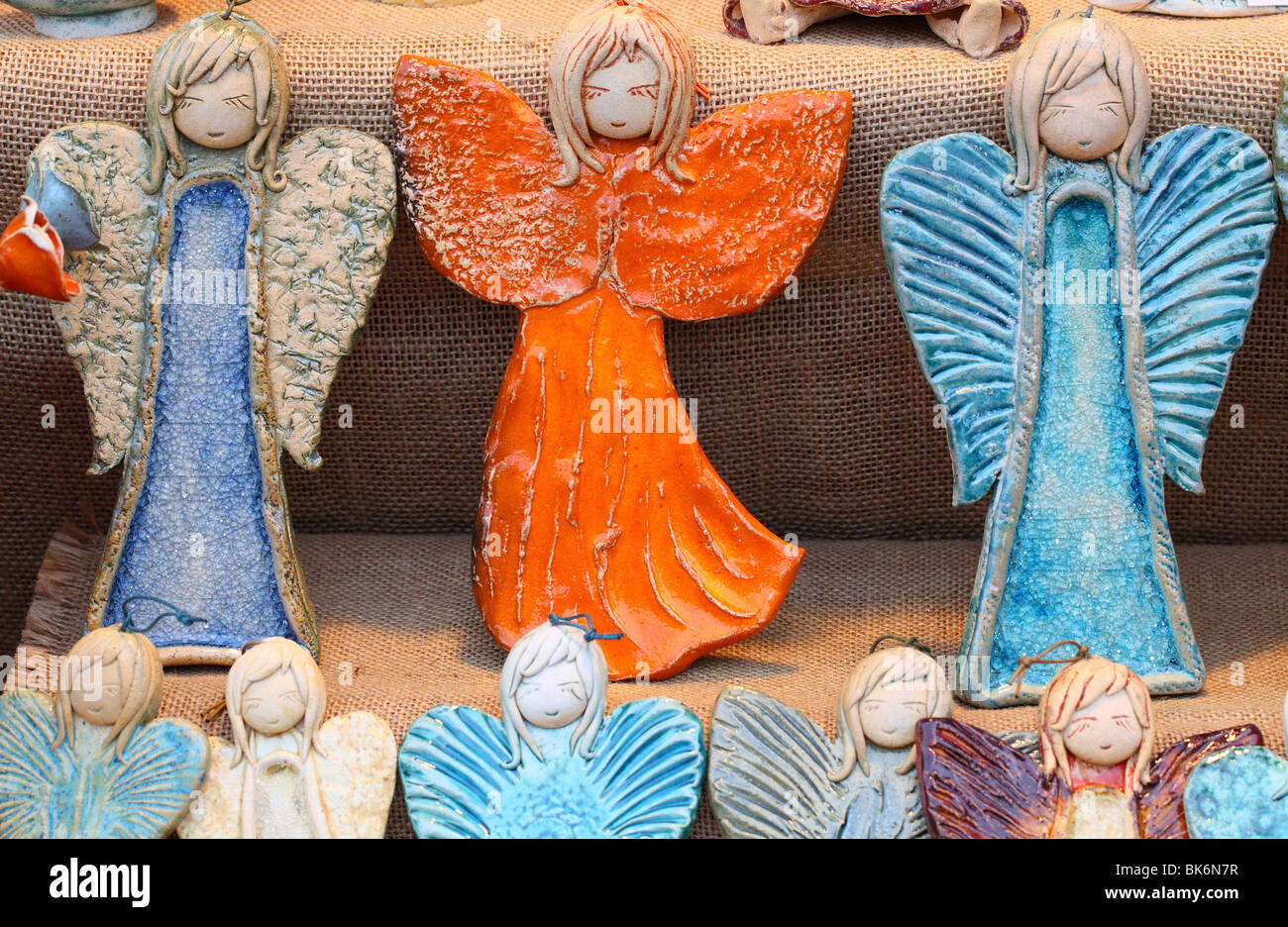 Colorful figures of Angels Stock Photo - Alamy