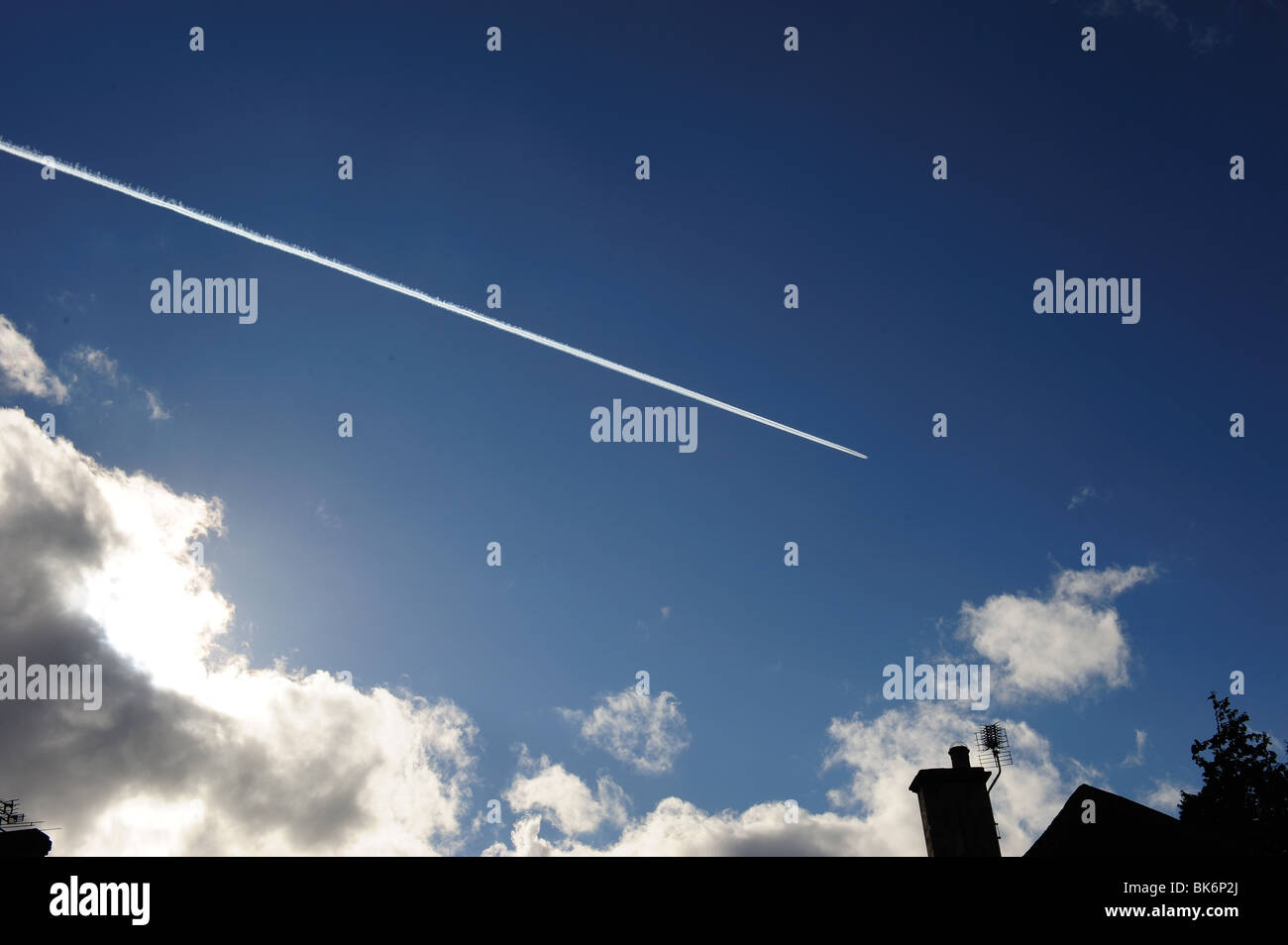 Jet trail in sky Stock Photo - Alamy