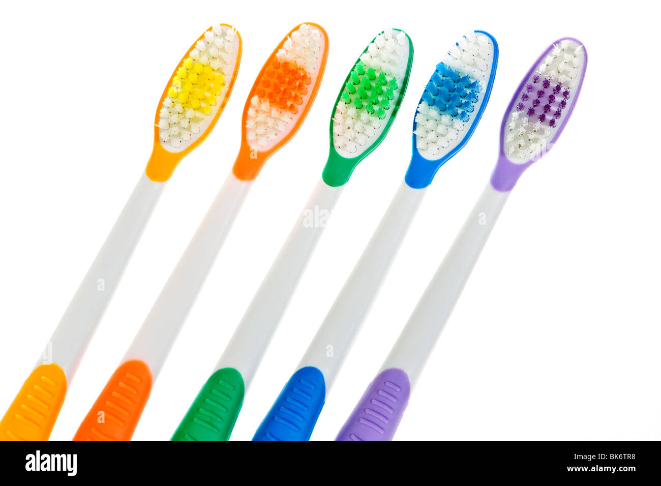 Close up of multicolored toothbrushes on white background Stock Photo ...