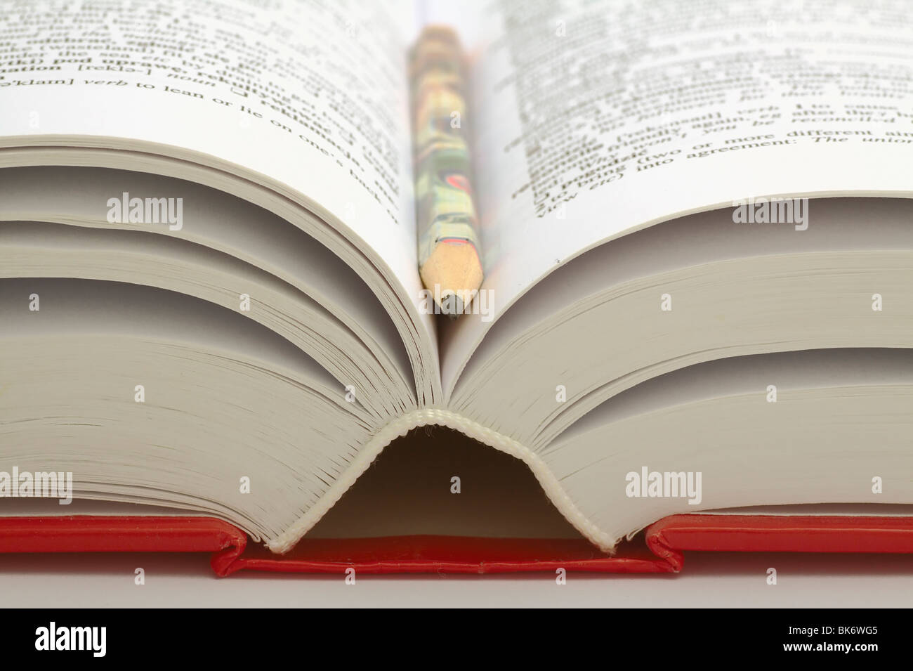 Pencil on the book Stock Photo - Alamy