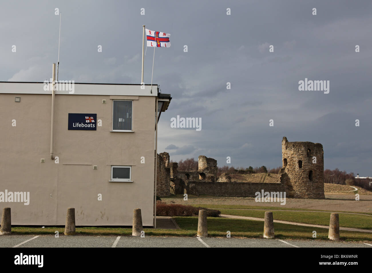 Flint RNLI lifeboat station and castle by River Dee, Flintshire, North ...