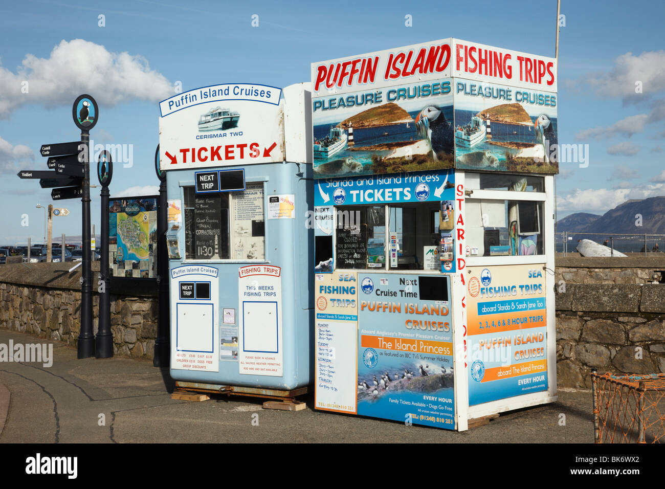 Puffin Island cruise ticket kiosks on seafront on the Menai Strait ...
