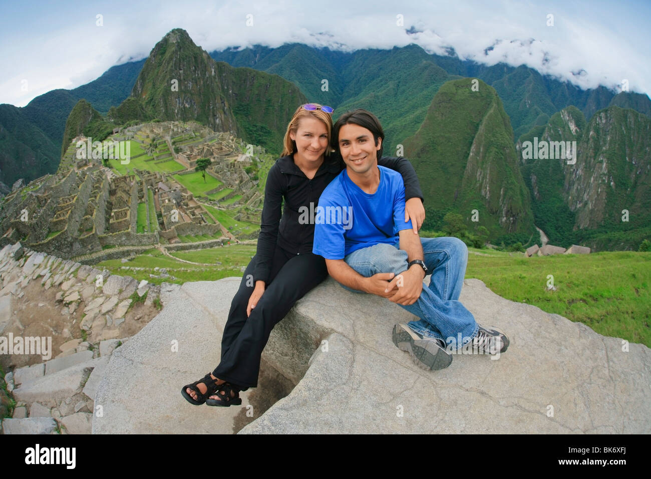 A Young Couple Smiling At Machu Picchu, Peru Stock Photo - Alamy