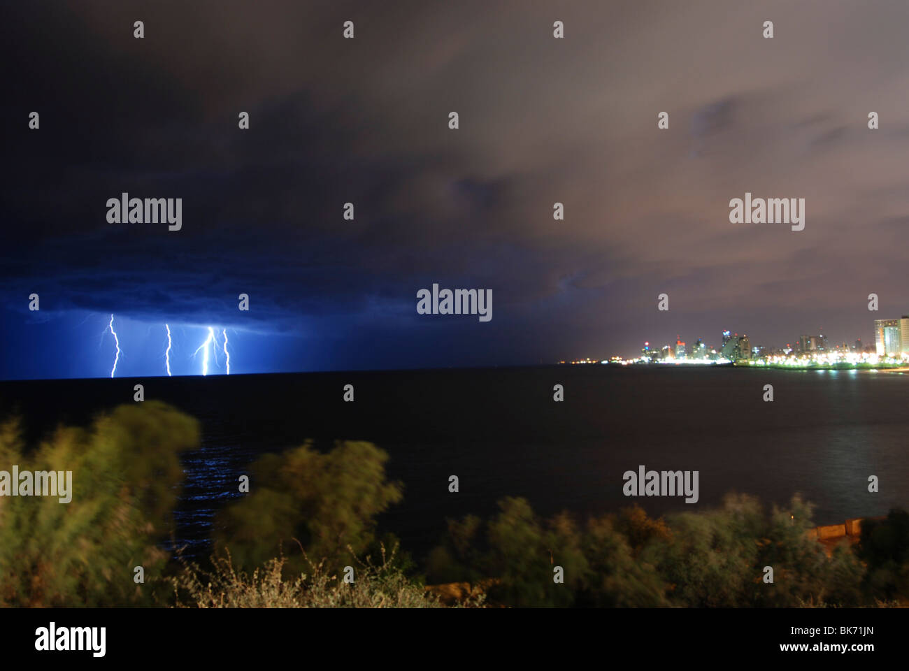 Israel, Tel Aviv, Lightning storm over the Mediterranean Sea. The Tel ...
