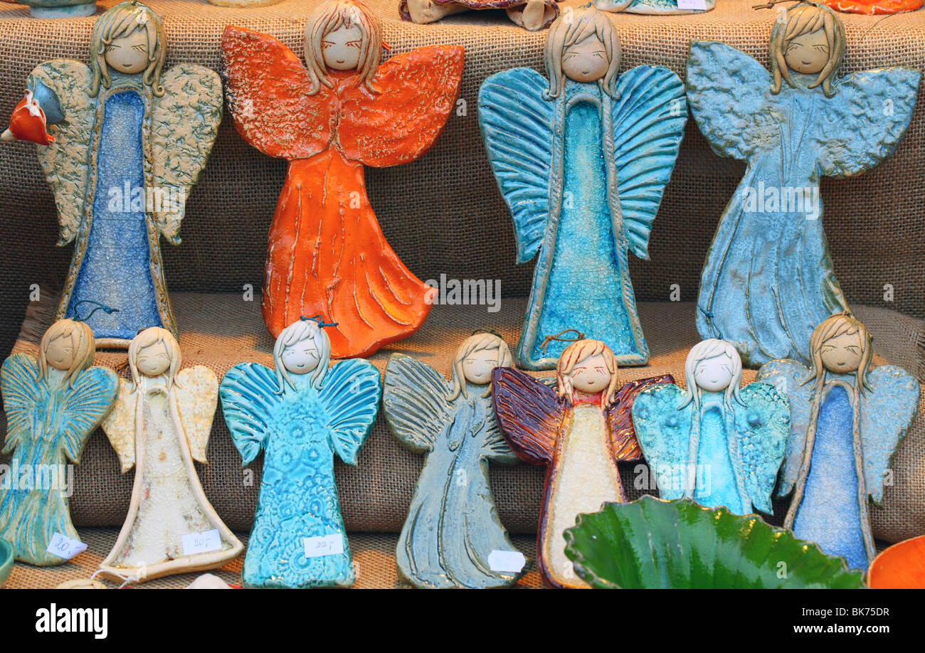 Colorful figures of Angels Stock Photo - Alamy