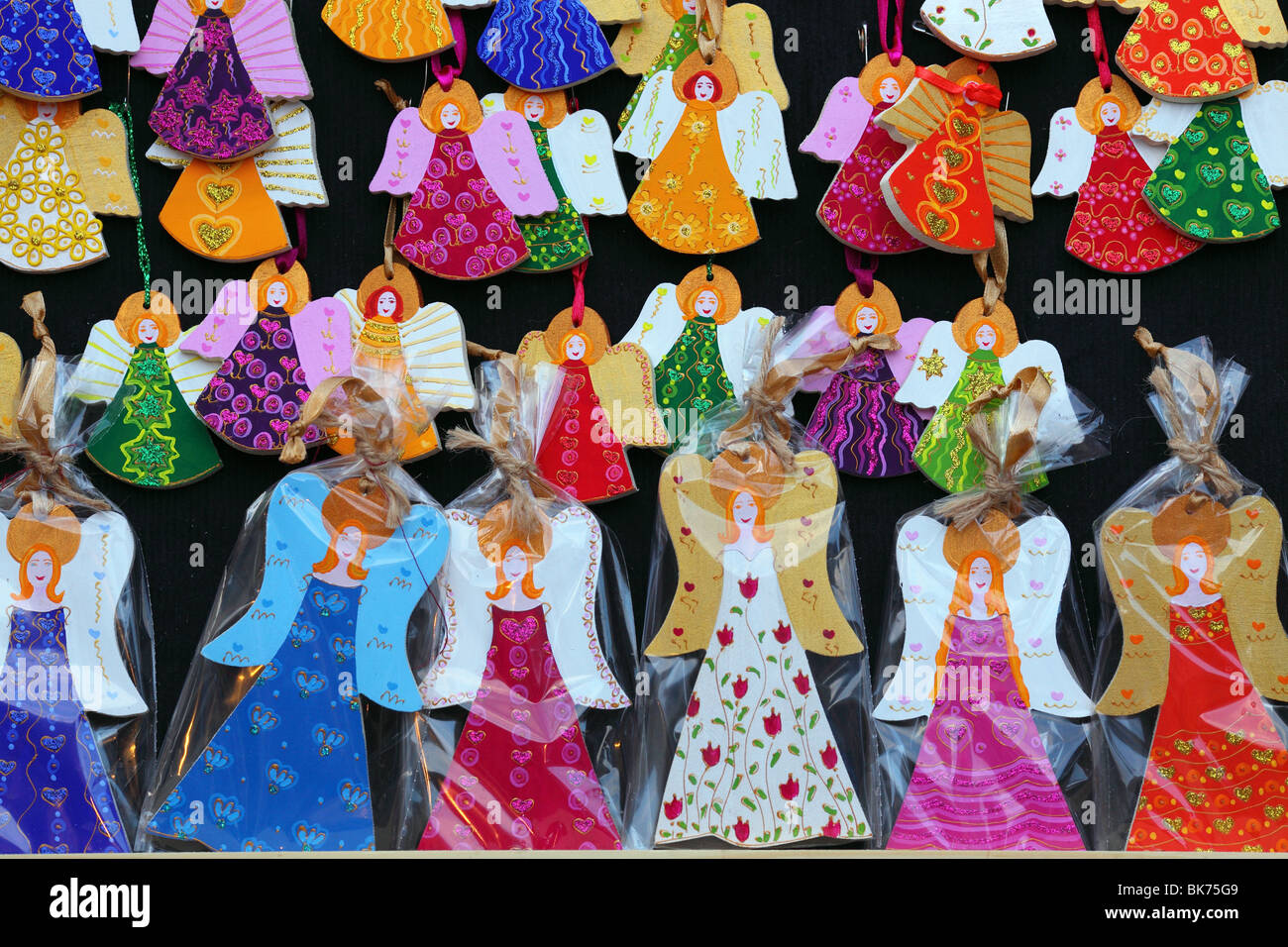 Colorful figures of Angels Stock Photo - Alamy