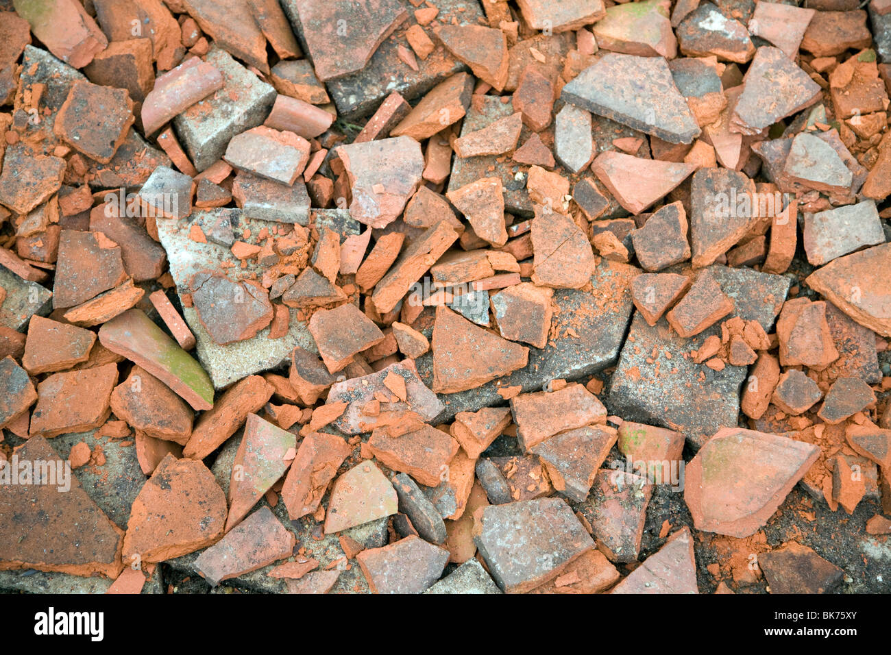 Broken red roofing pan tiles Stock Photo - Alamy