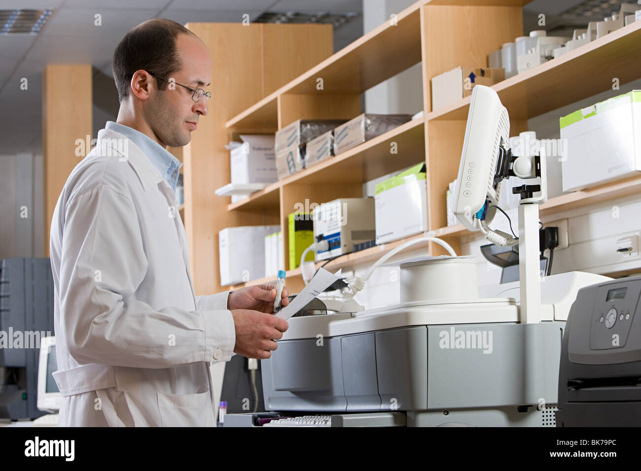 Technician in laboratory Stock Photo - Alamy