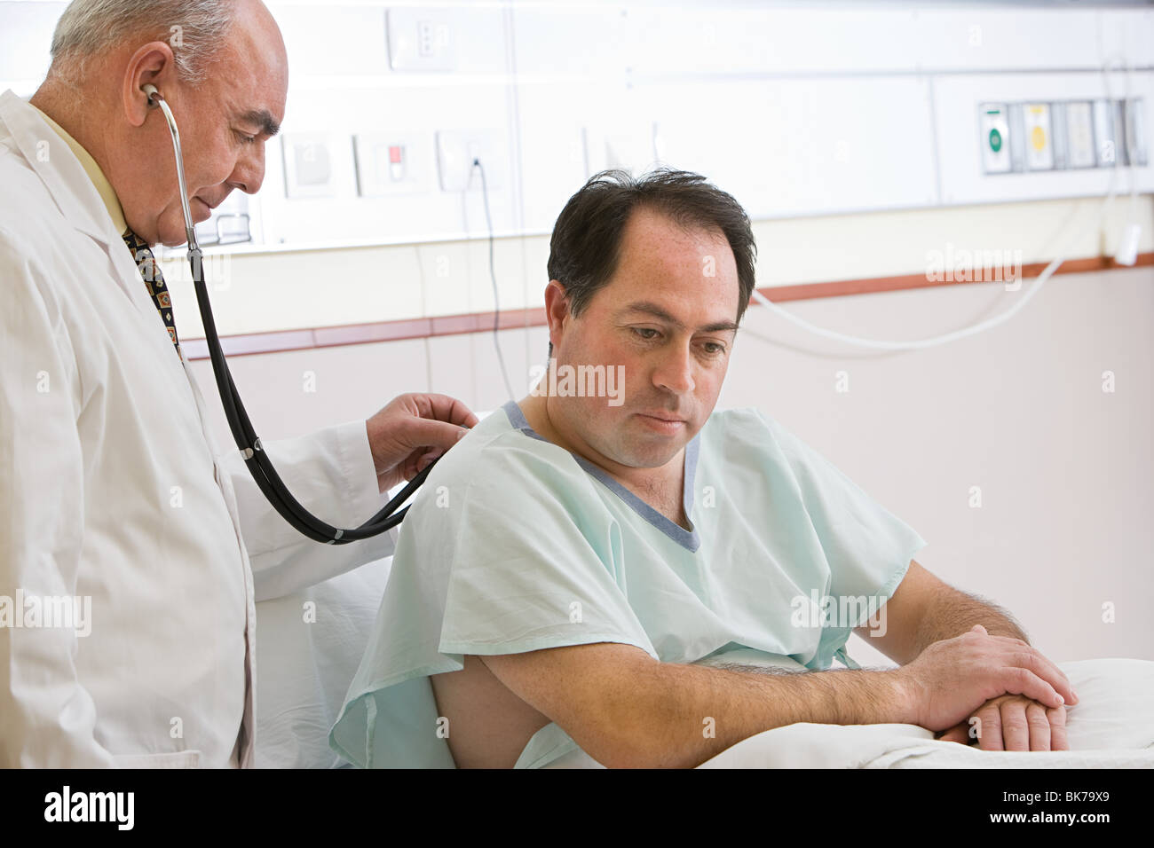 Doctor and patient in hospital Stock Photo - Alamy