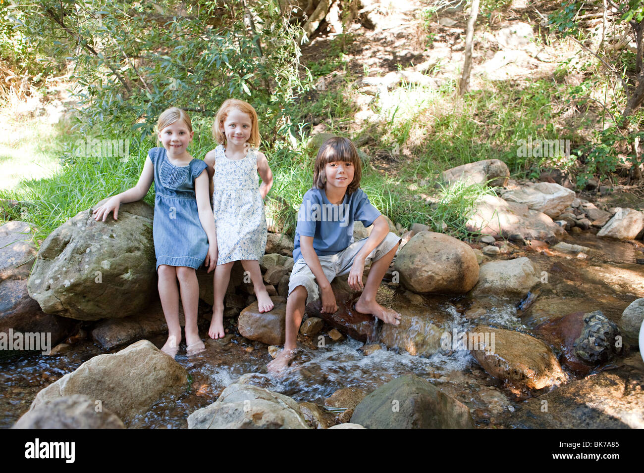 Child and rocks hi-res stock photography and images - Alamy