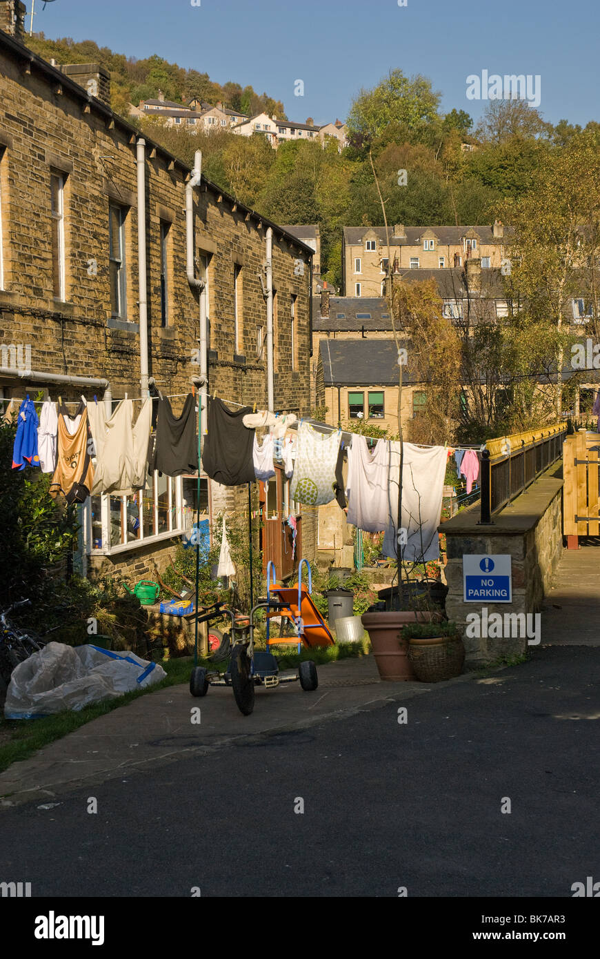 Washing hanging out to dry in street Stock Photo - Alamy