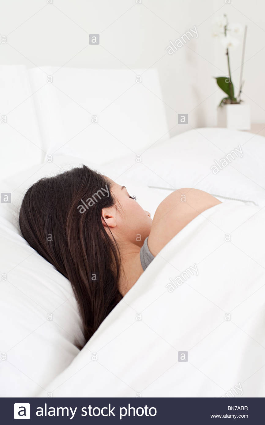 One Woman Sleeping Bed Stock Photos & One Woman Sleeping Bed Stock ...