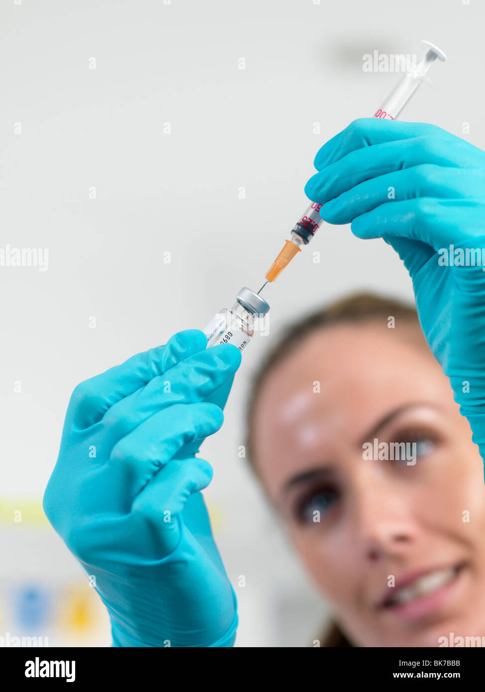 Doctor filling a syringe Stock Photo - Alamy