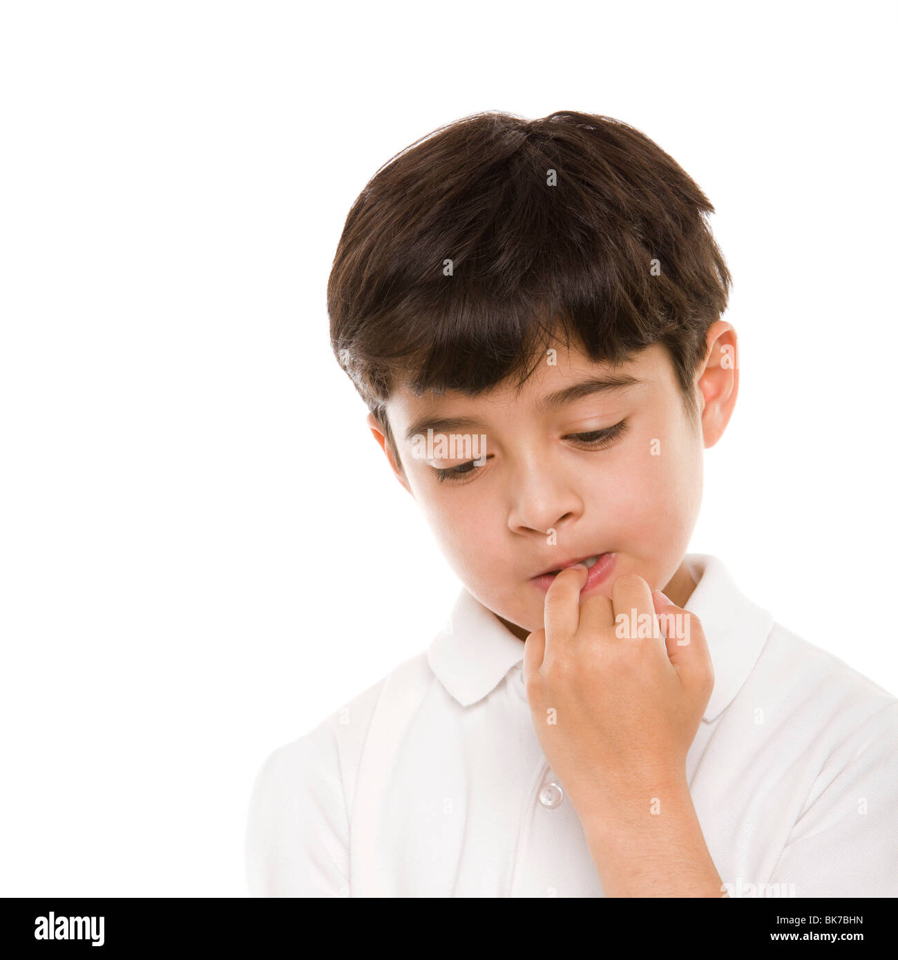 Boy biting his nails Stock Photo - Alamy